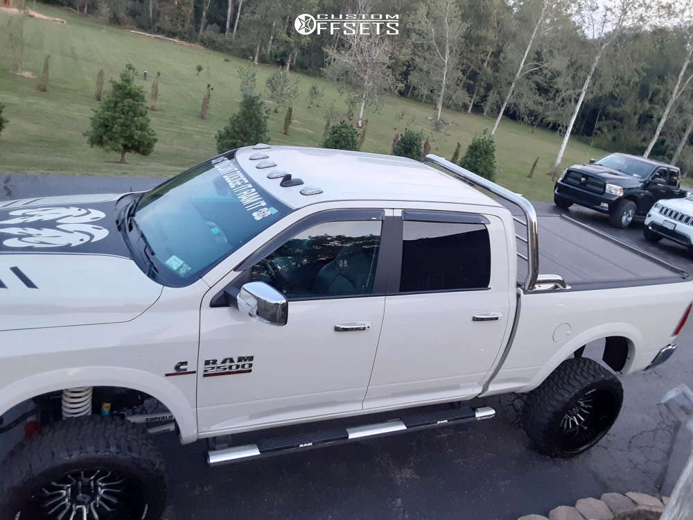2018 Ram 2500 with 24x12 -51 Vision Riot and 35/12.5R24 Haida Mud Champ ...