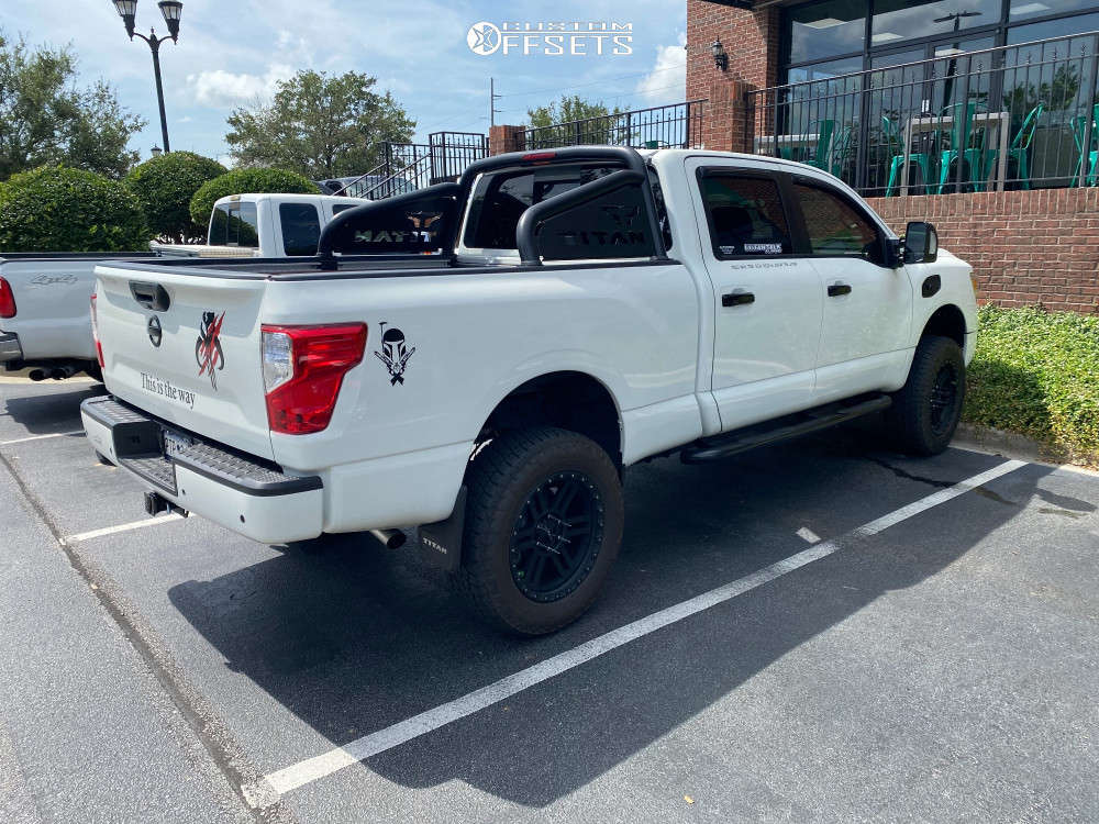 2021 Nissan Titan XD with 20x9 -12 Vision Manx 2 and 275/65R20 Nitto ...