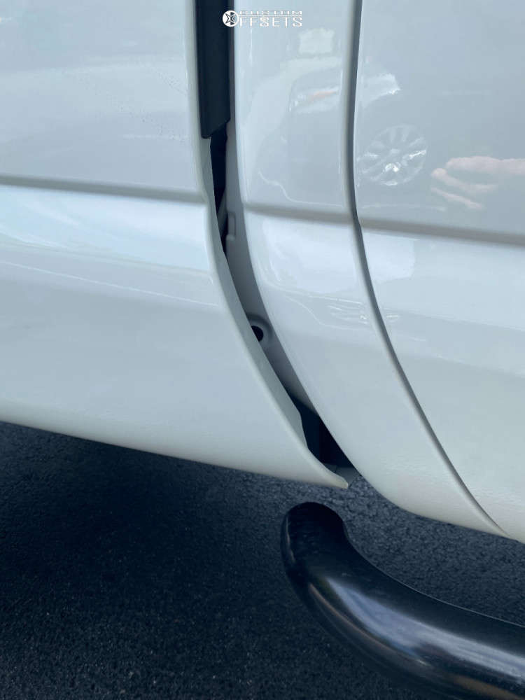 2021 Nissan Titan XD with 20x9 -12 Vision Manx 2 and 275/65R20 Nitto ...