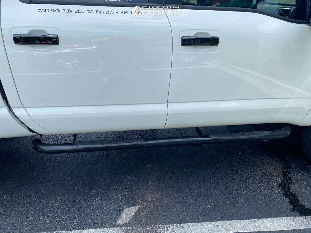 2021 Nissan Titan XD with 20x9 -12 Vision Manx 2 and 275/65R20 Nitto ...