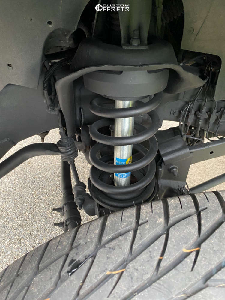 2013 Ram 2500 with 20x10 -34 Black Rhino Centurion and 32/10.5R20 Toyo ...