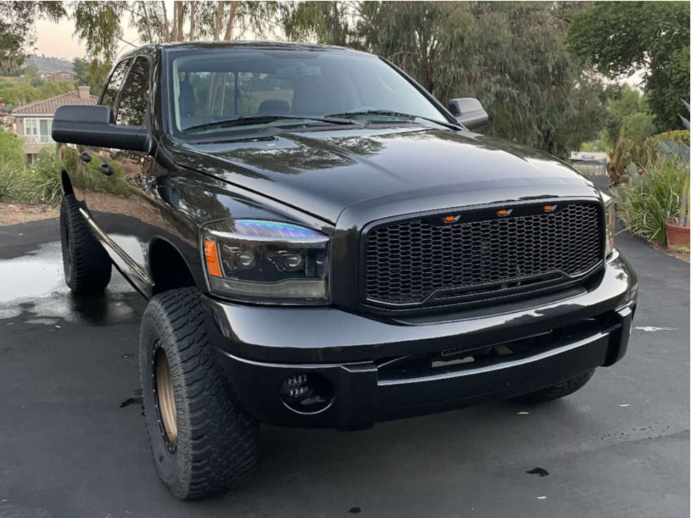 2006 Dodge Ram 1500 with 17x9 -12 Raceline 935BZ Defender and 35/12 ...