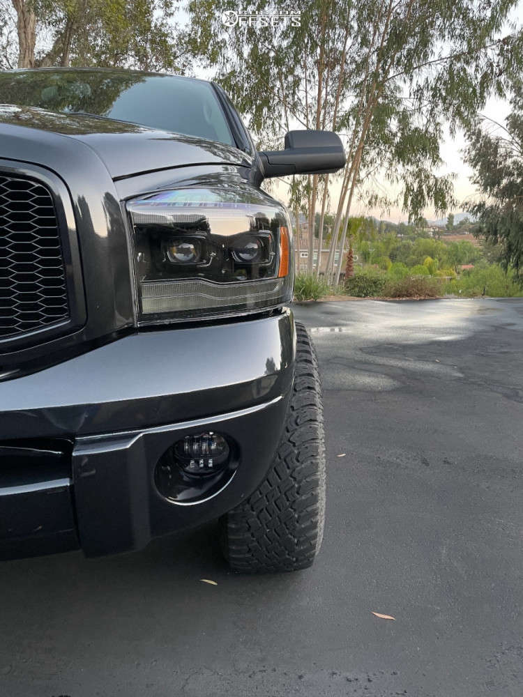 2006 Dodge Ram 1500 with 17x9 -12 Raceline 935BZ Defender and 35/12 ...