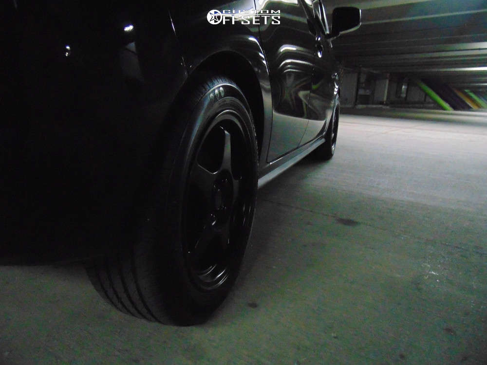 2020 Mitsubishi Mirage with 15x6.5 35 AVID1 AV8 and 195/50R15 Tatko Geo ...