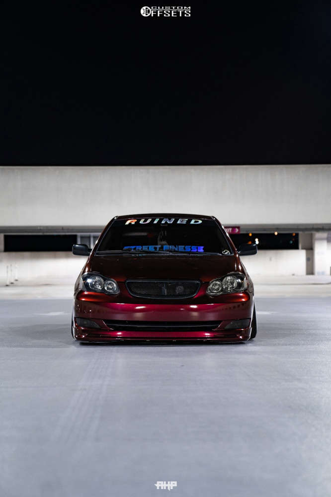 2008 Toyota Corolla with 18x8.5 30 ESR Sr06 and 195/35R18 Atlas Force ...