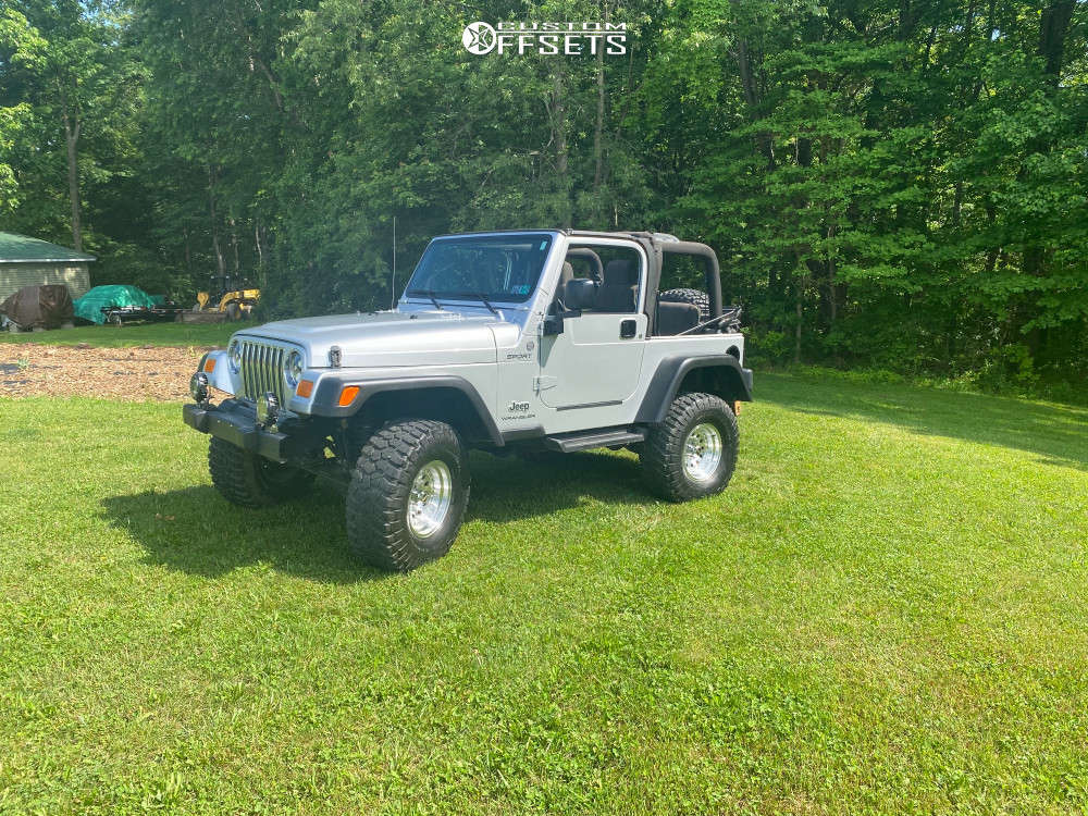 2004 Jeep Wrangler with 16x10 0 Pro Comp Outlaw 2 and 33/12.5R16 ...
