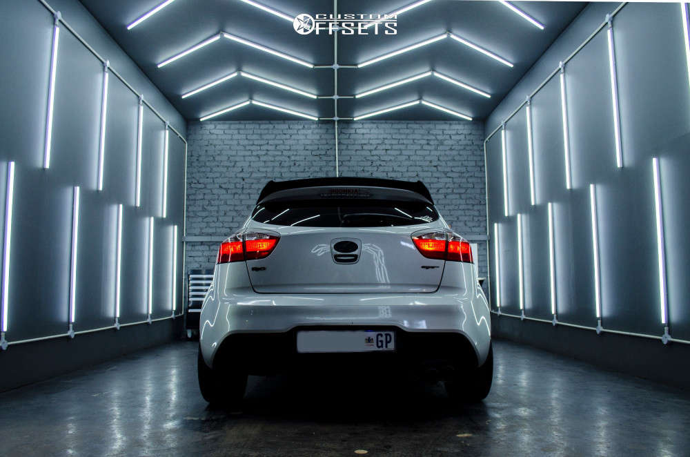 2012 Kia Rio with 17x7.5 35 Work Vs Xx and 215/45R17 Yokohama Advan ...