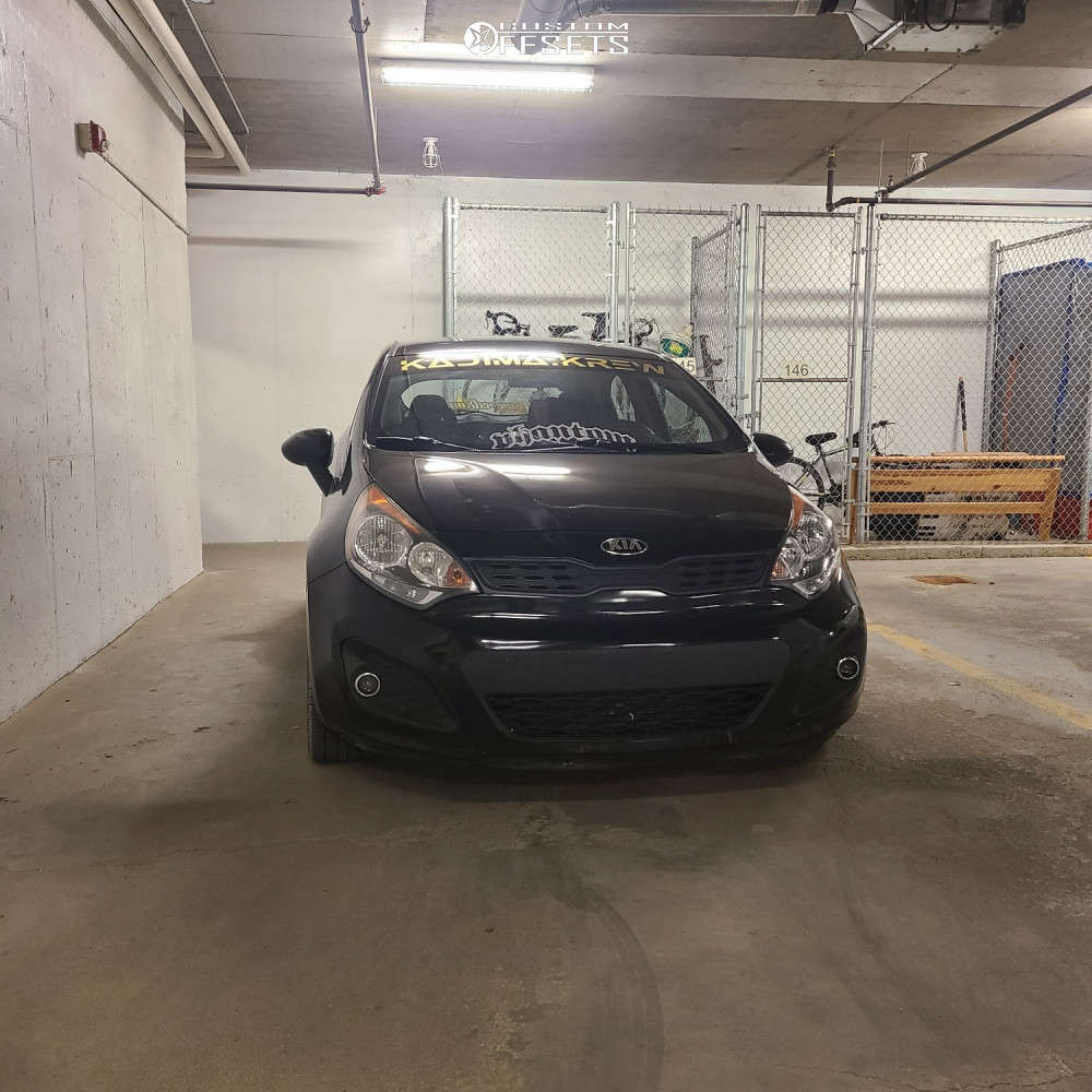 2013 Kia Rio with 18x7 38 Focal F-7 and 215/35R18 Goodride SA-07 and ...