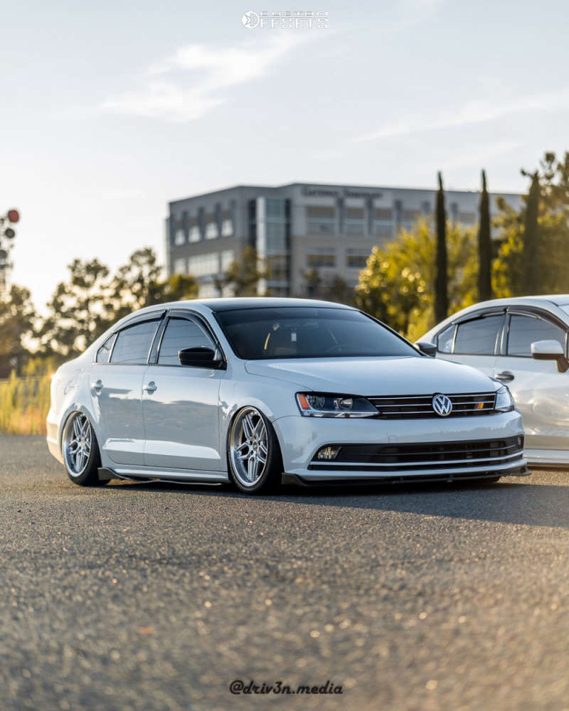 2016 Volkswagen Jetta with 18x8.5 30 ESR Cs15 and 225/40R18 Firestone ...