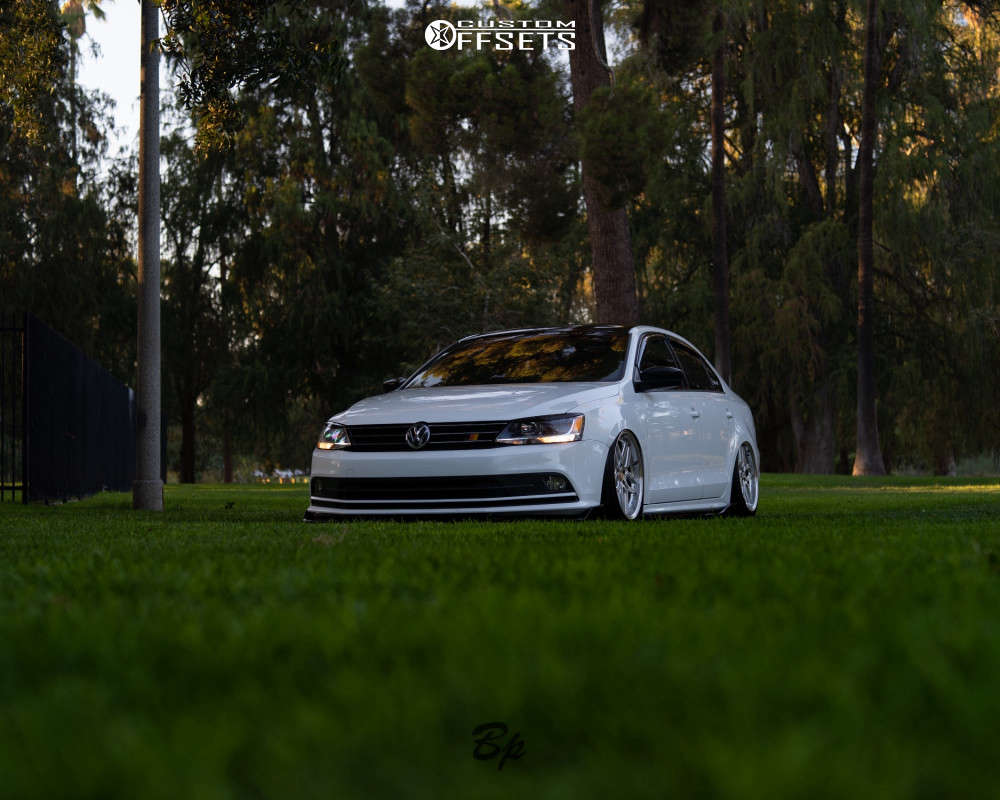2016 Volkswagen Jetta with 18x8.5 30 ESR Cs15 and 225/40R18 Firestone ...