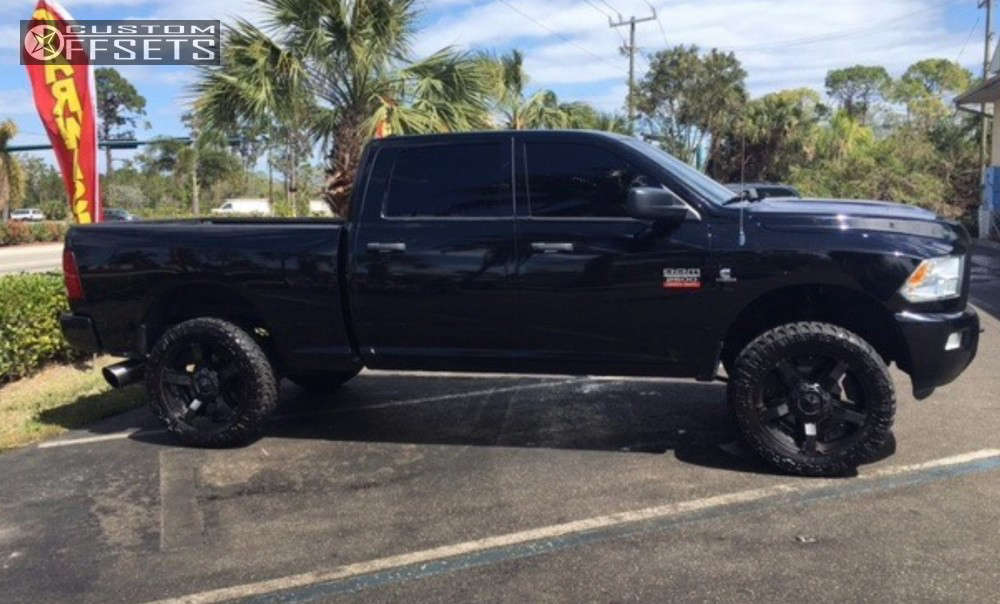 2012 Ram 2500 with 22x9.5 12 XD Rockstar Ii and 35/12.5R22 Black Bear ...