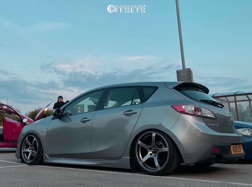 2010 Mazda 3 with 18x8.5 38 Japan Racing Jr32 and 215/35R18 Goodyear ...