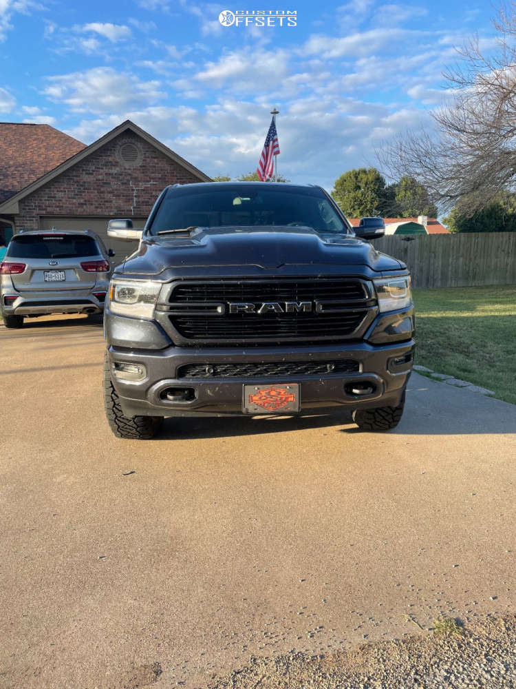 2020 Ram 1500 with 20x9 1 Fuel Tech and 35/11.5R20 Nitto Ridge Grappler ...