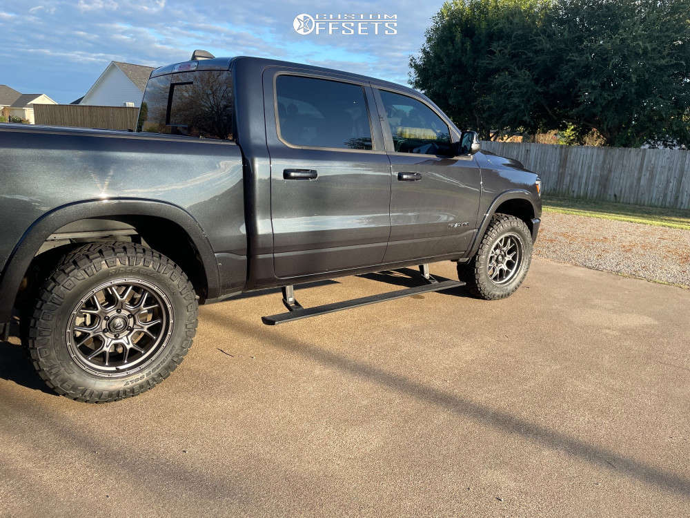 2020 Ram 1500 with 20x9 1 Fuel Tech and 35/11.5R20 Nitto Ridge Grappler ...