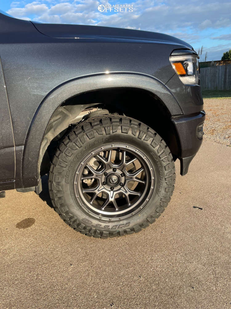 2020 Ram 1500 with 20x9 1 Fuel Tech and 35/11.5R20 Nitto Ridge Grappler ...