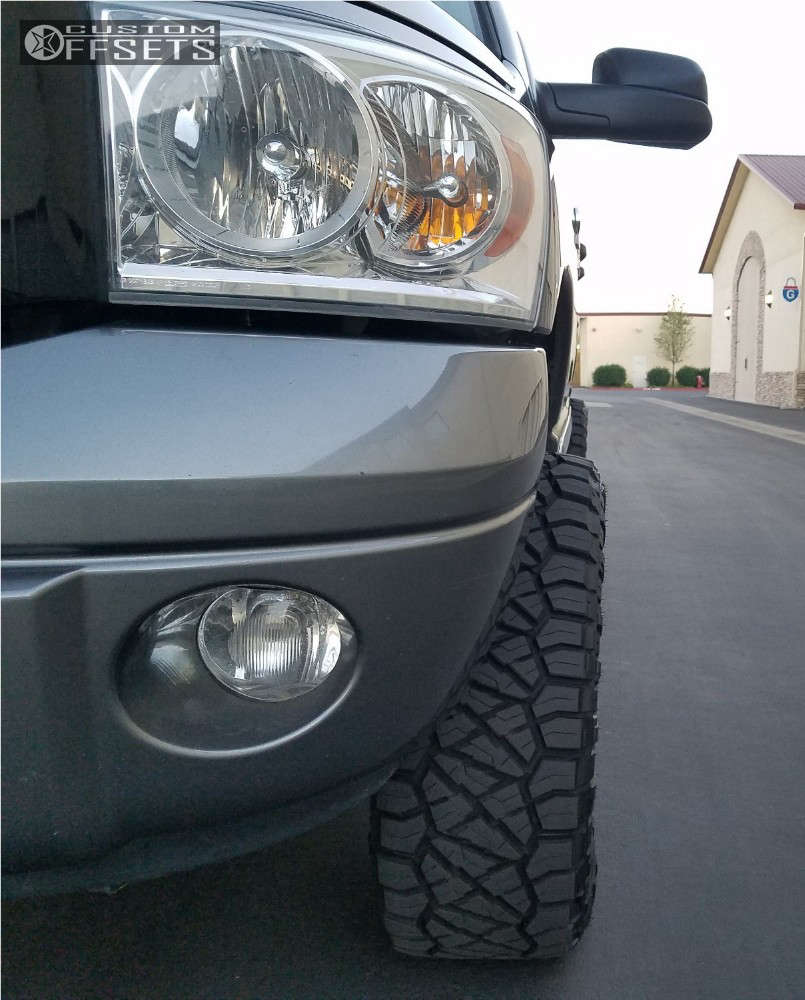 2007 Dodge Ram 2500 with 18x9 -12 KX CP01 and 33/12.5R18 Nitto Ridge ...