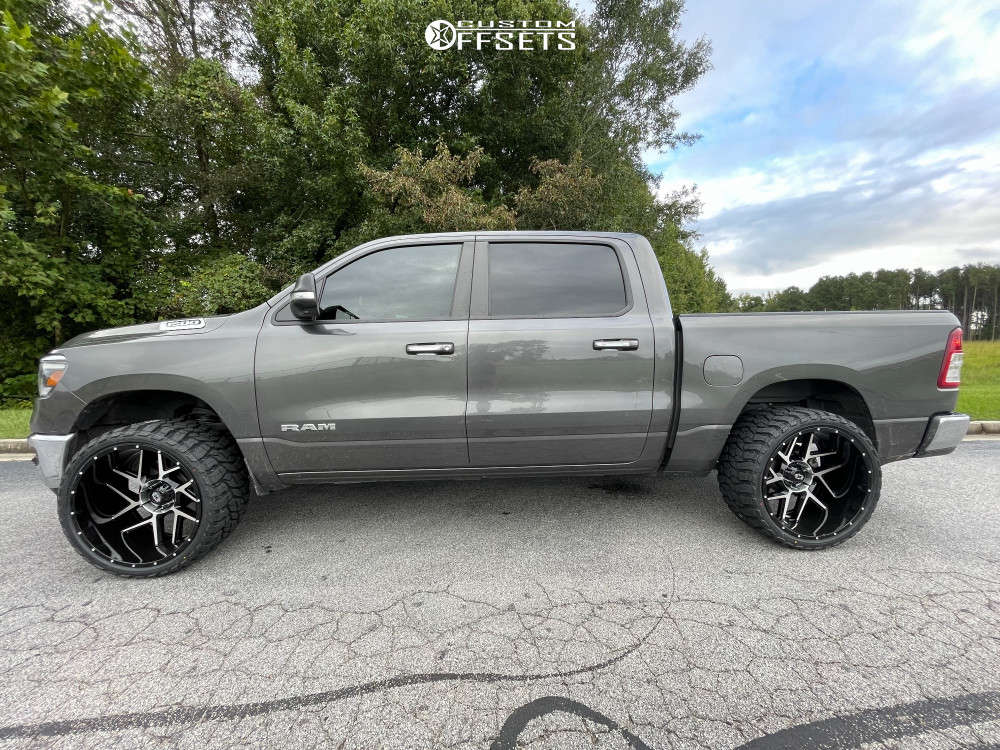 2020 Ram 1500 with 24x12 -57 Vision Sliver and 33/12.5R24 Landspider ...