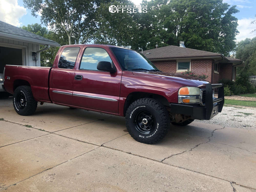 2004 Chevrolet Silverado 1500 with 16x8 -12 Vision Soft 8 and 265/75R16 ...
