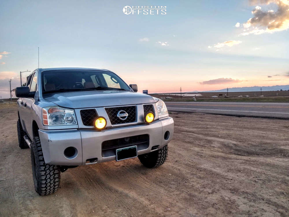 2004 Nissan Titan with 16x8 -12 Vision Soft 8 and 285/75R16 Thunderer ...