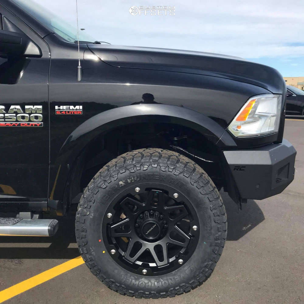 2014 Ram 2500 with 20x9 12 Vision Se7en and 35/12.5R20 Venom Power ...