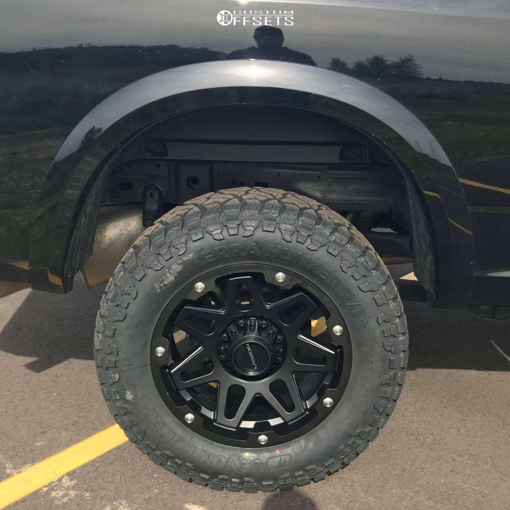 2014 Ram 2500 with 20x9 12 Vision Se7en and 35/12.5R20 Venom Power ...