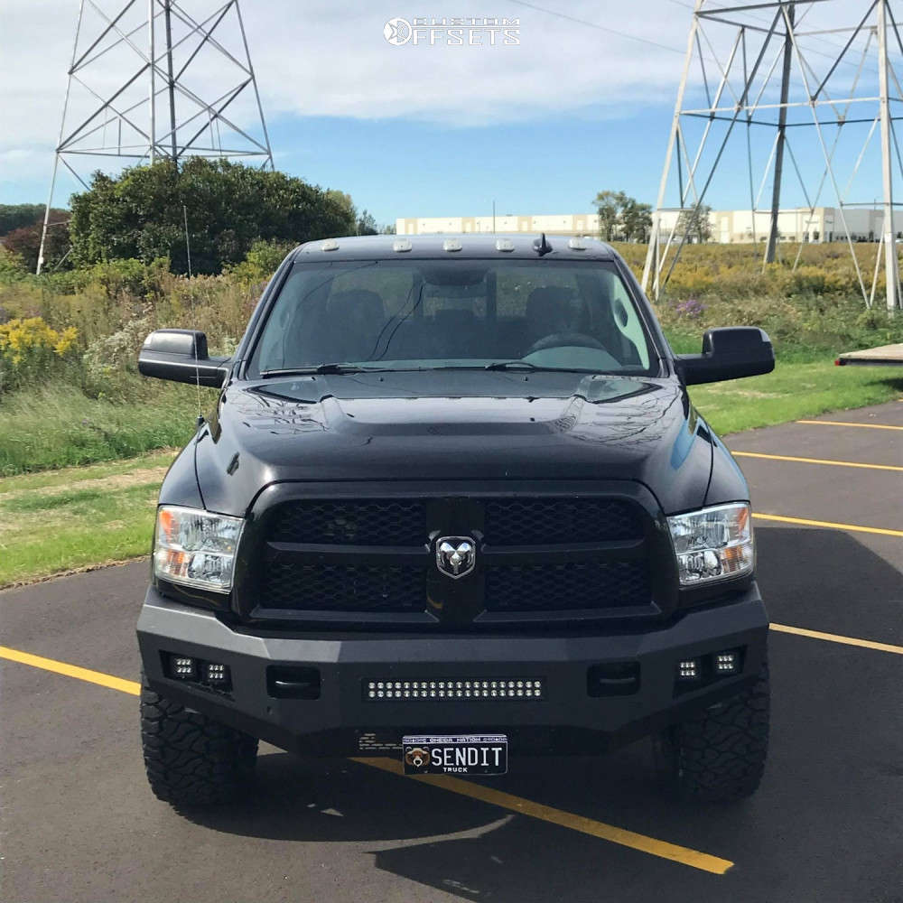 2014 Ram 2500 with 20x9 12 Vision Se7en and 35/12.5R20 Venom Power ...