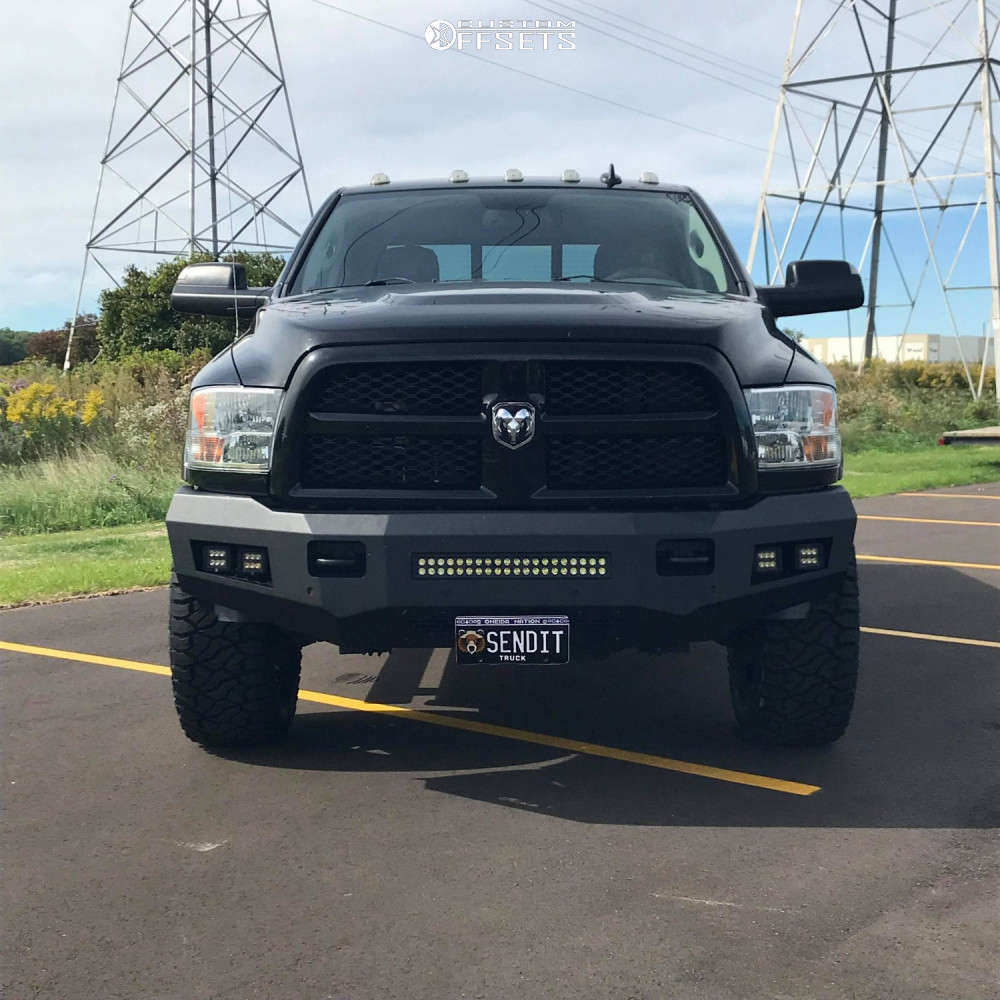 2014 Ram 2500 with 20x9 12 Vision Se7en and 35/12.5R20 Venom Power ...