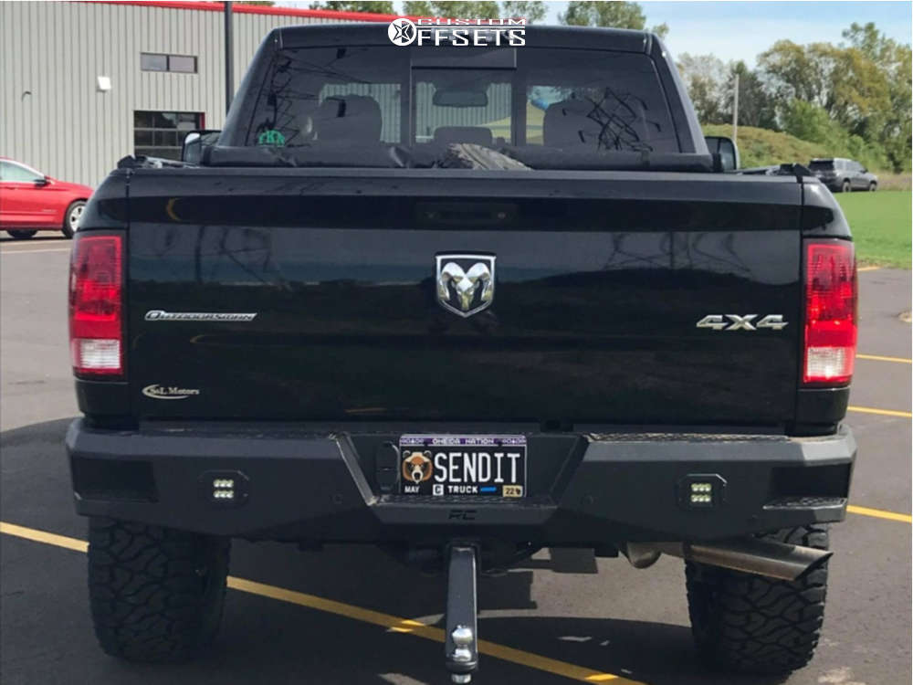 2014 Ram 2500 with 20x9 12 Vision Se7en and 35/12.5R20 Venom Power ...