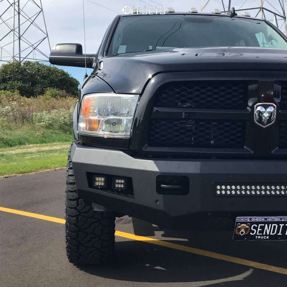 2014 Ram 2500 with 20x9 12 Vision Se7en and 35/12.5R20 Venom Power ...