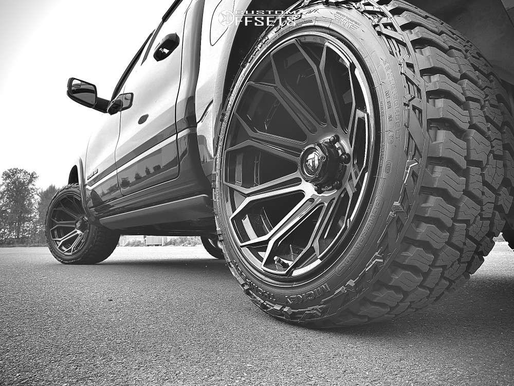 2019 Ram 1500 with 22x12 -44 Fuel Siege and 33/12.5R22 Mickey Thompson ...