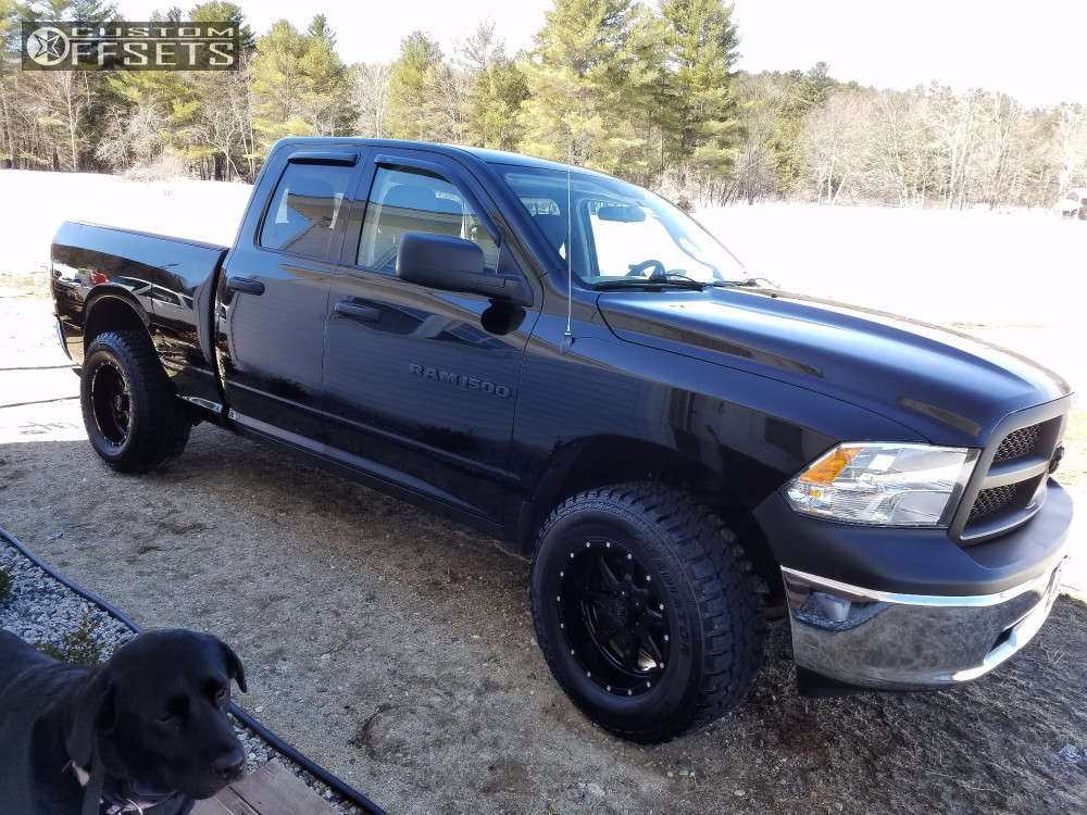 2012 Ram 1500 with 18x10 -13 Tuff T15 and 33/12.5R18 Gladiator QR900-MT ...