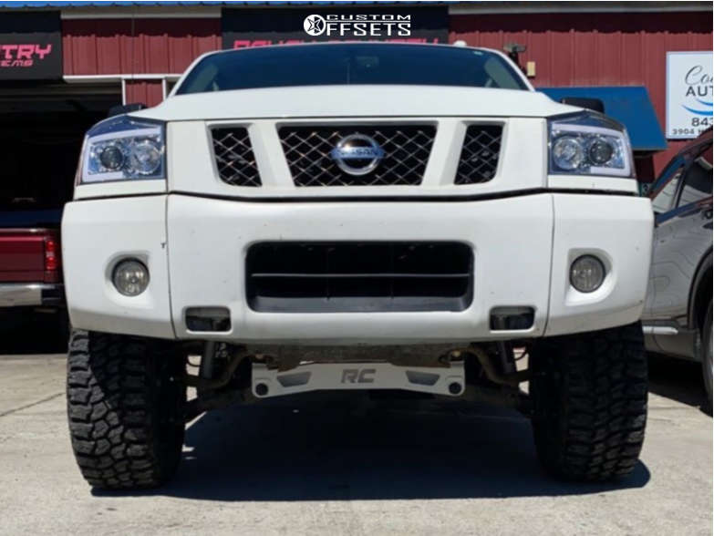 2014 Nissan Titan with 17x13 -12 KMC Rockstar 3 and 33/12.5R17 Americus ...