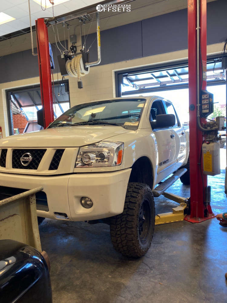 2014 Nissan Titan with 17x13 -12 KMC Rockstar 3 and 33/12.5R17 Americus ...