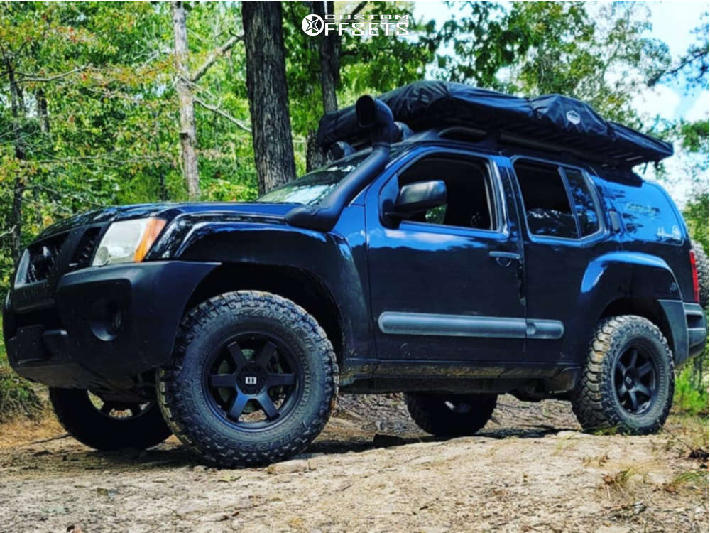 2014 Nissan Xterra with 17x9 0 Level 8 Mk6 and 33/12.5R17 Falken ...