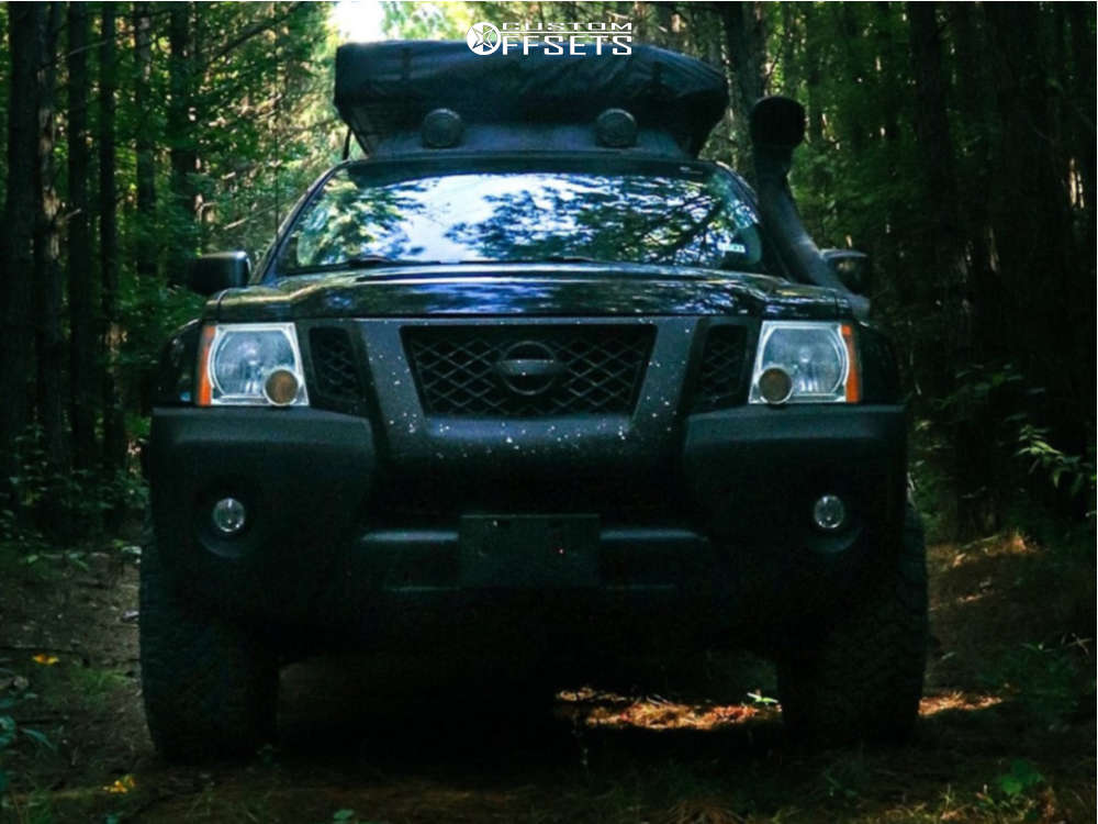 2014 Nissan Xterra with 17x9 0 Level 8 Mk6 and 33/12.5R17 Falken ...