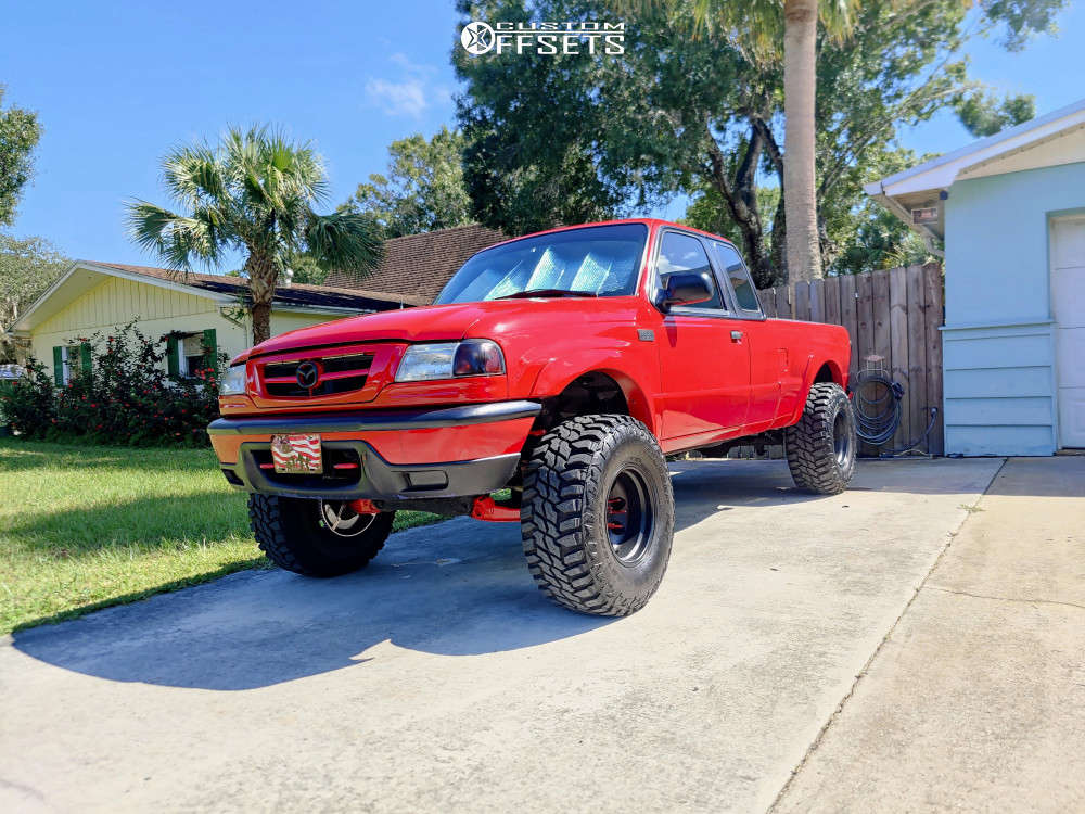 2001 Mazda B3000 with 15x10 -47 Pro Comp 69 and 33/12.5R15 Mastercraft ...