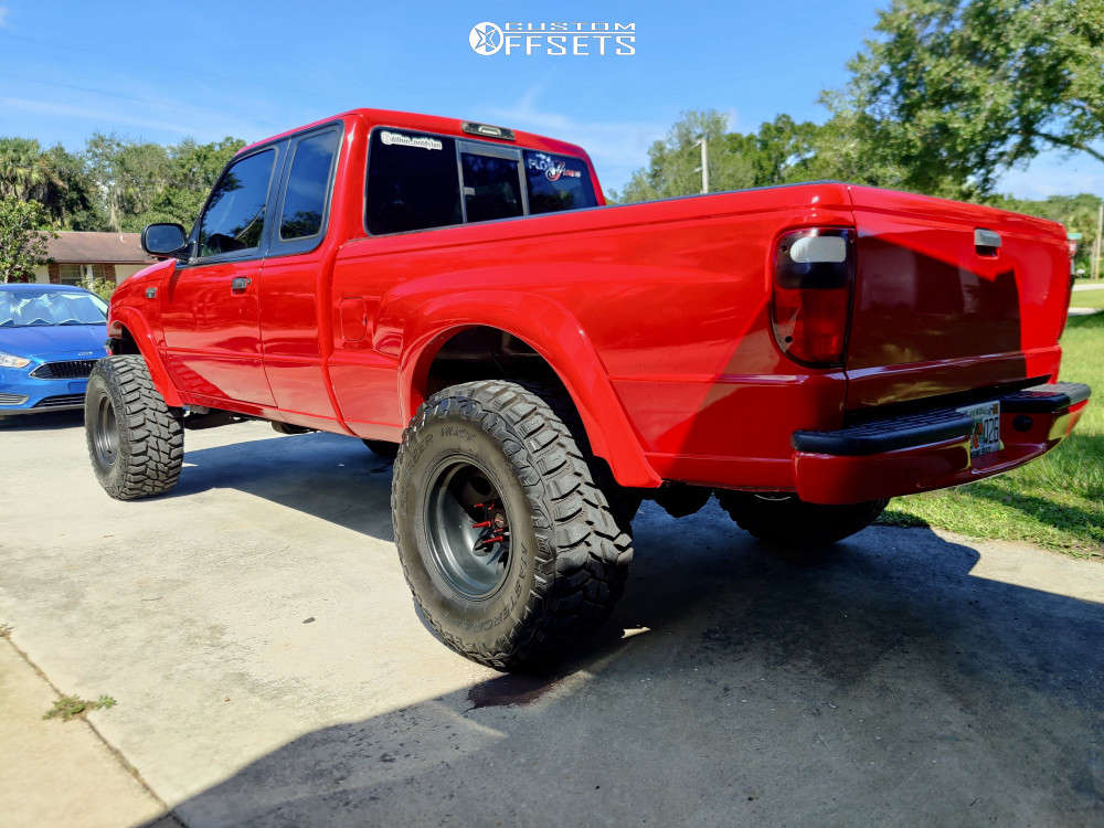 2001 Mazda B3000 with 15x10 -47 Pro Comp 69 and 33/12.5R15 Mastercraft ...