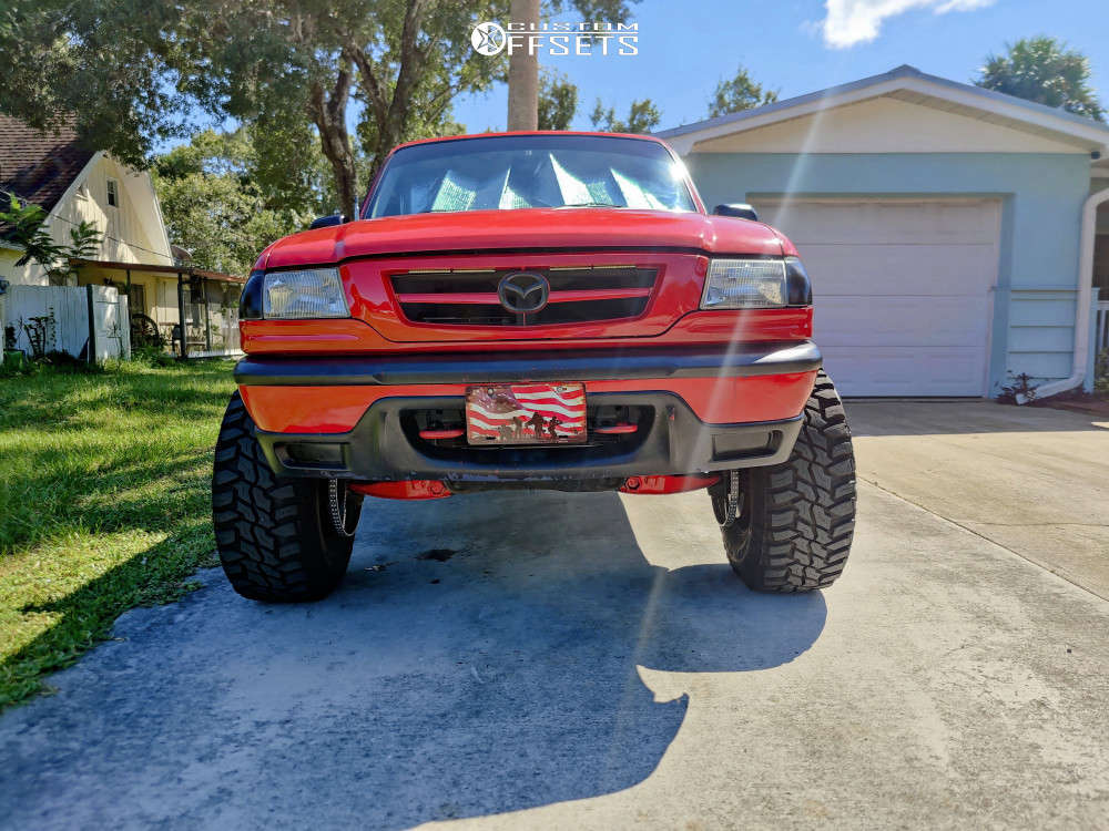 2001 Mazda B3000 with 15x10 -47 Pro Comp 69 and 33/12.5R15 Mastercraft ...