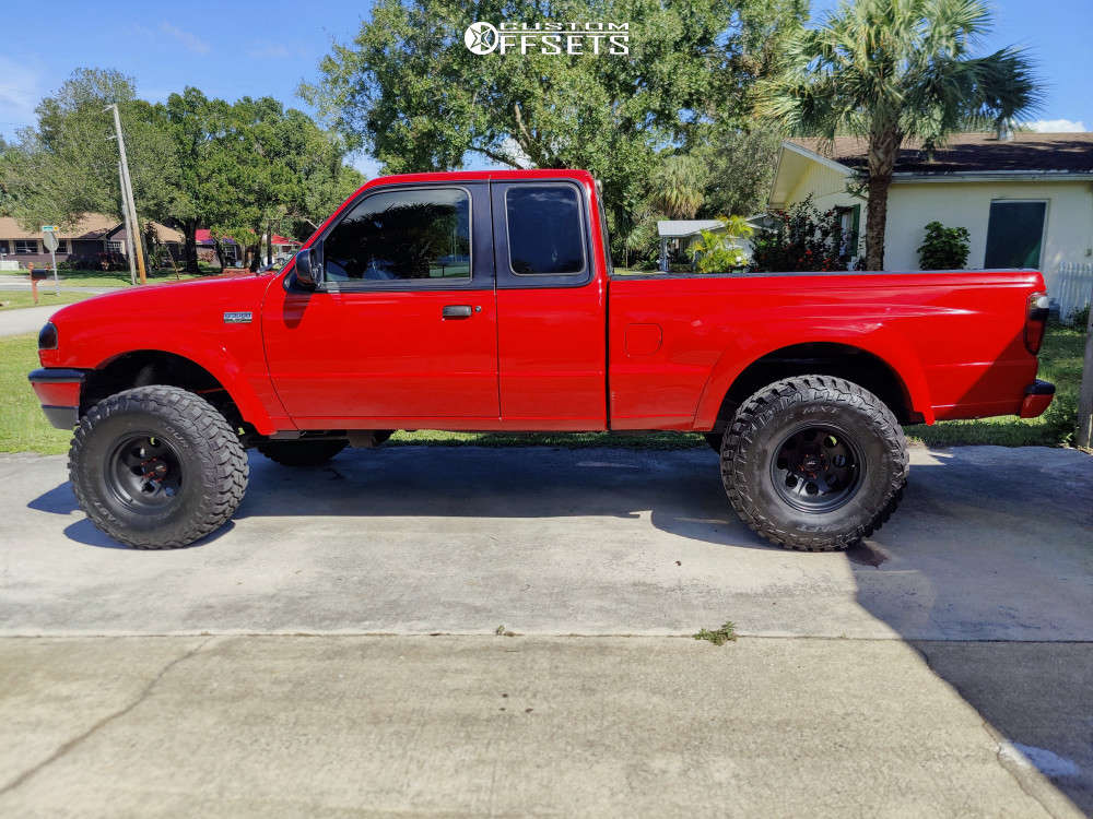 2001 Mazda B3000 with 15x10 -47 Pro Comp 69 and 33/12.5R15 Mastercraft ...