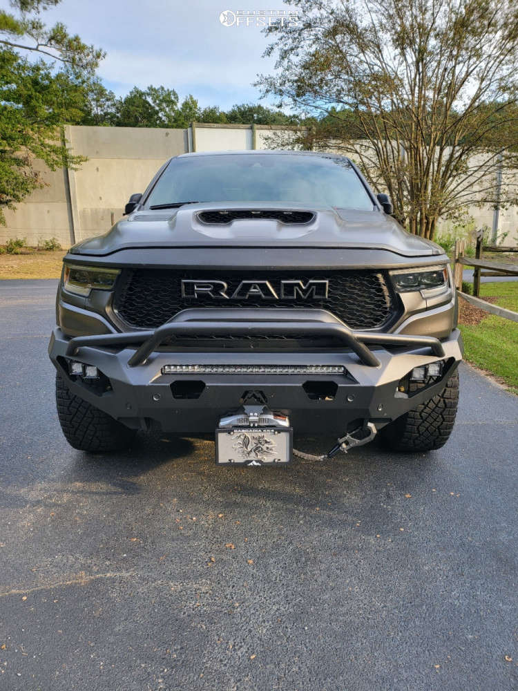 2021 Ram 1500 with 18x9.5 -12 Black Rhino Shredder and 325/65R18 ...