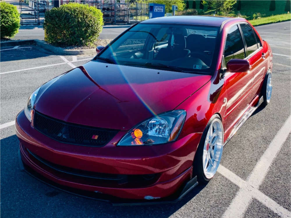 2006 Mitsubishi Lancer with 18x9.5 22 ESR Cs15 and 215/40R18 Lionhart ...
