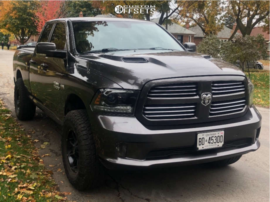 2015 Ram 1500 with 17x9 -12 Mayhem Rampage and 305/70R17 Cooper ...
