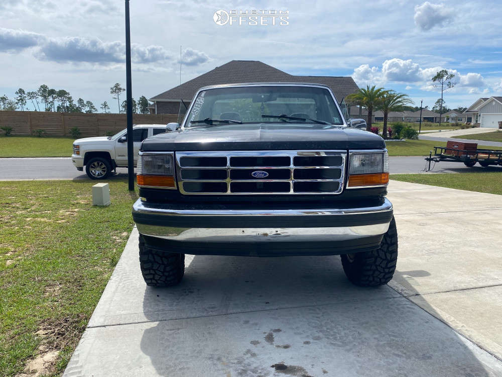 1992 Ford F-150 with 15x10 -47 Pro Comp 69 and 33/12.5R15 Cooper ...