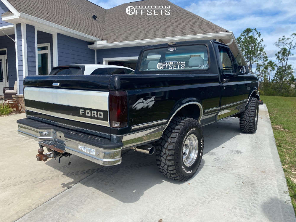 1992 Ford F-150 with 15x10 -47 Pro Comp 69 and 33/12.5R15 Cooper ...