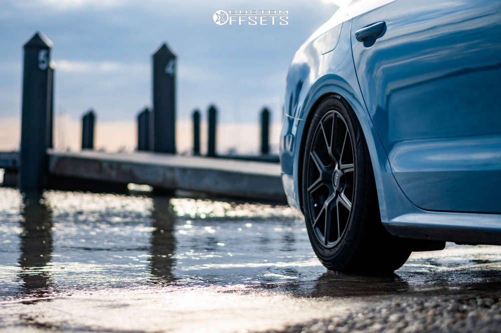 2014 Volkswagen Passat with 17x8 35 Voxx Lumi and 215/45R17 Sumitomo ...