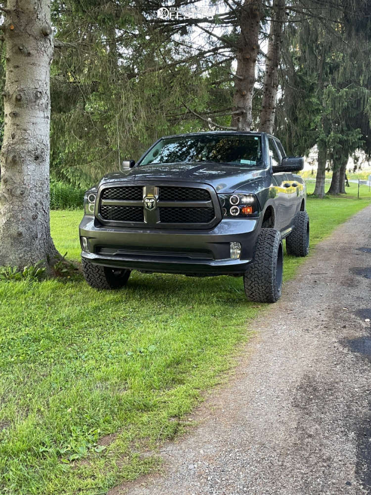 2016 Ram 1500 with 20x12 -55 Vision Rocker 412 and 33/12.5R20 Venom ...