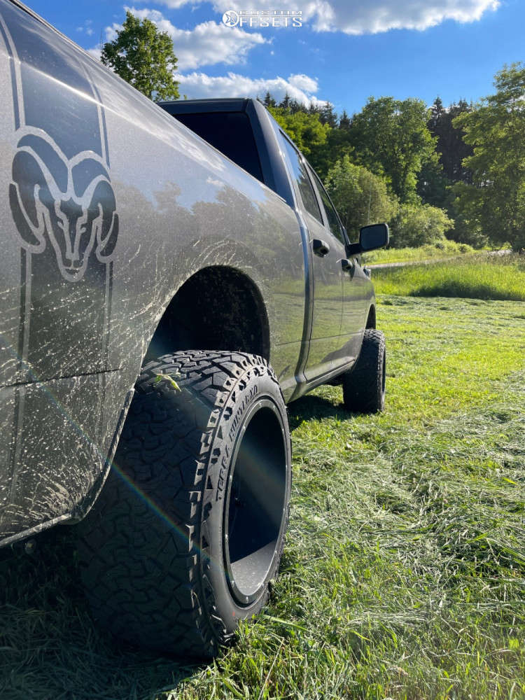 2016 Ram 1500 with 20x12 -55 Vision Rocker 412 and 33/12.5R20 Venom ...