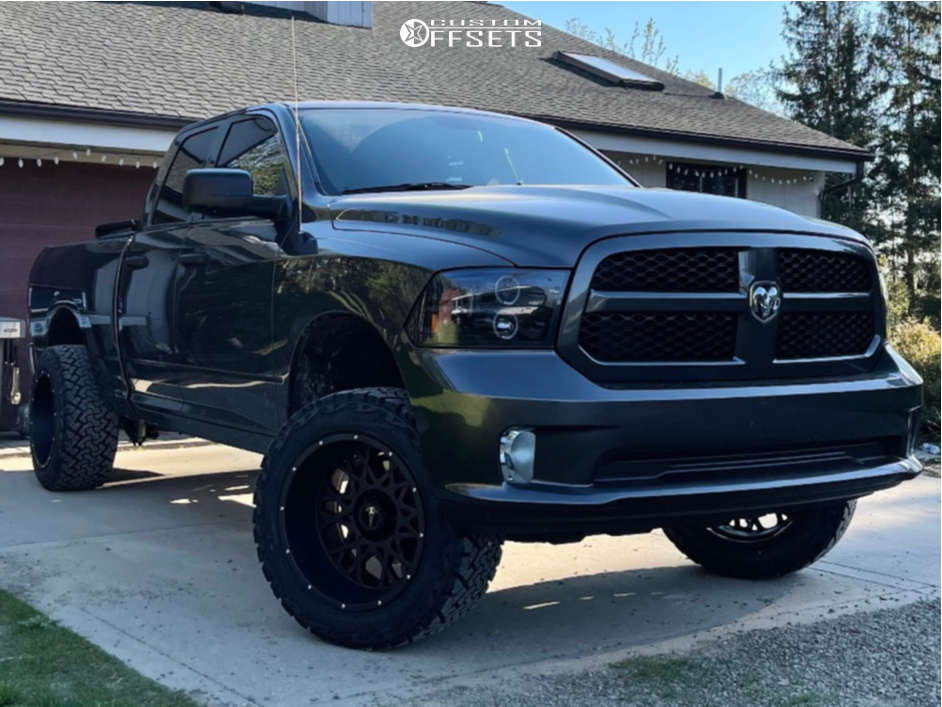 2016 Ram 1500 with 20x12 -55 Vision Rocker 412 and 33/12.5R20 Venom ...