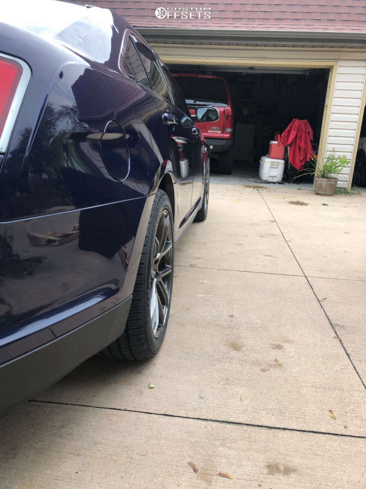 2011 Ford Taurus with 20x9 35 AVID1 SL02 and 255/45R20 Kumho Ecsta Pa51 ...