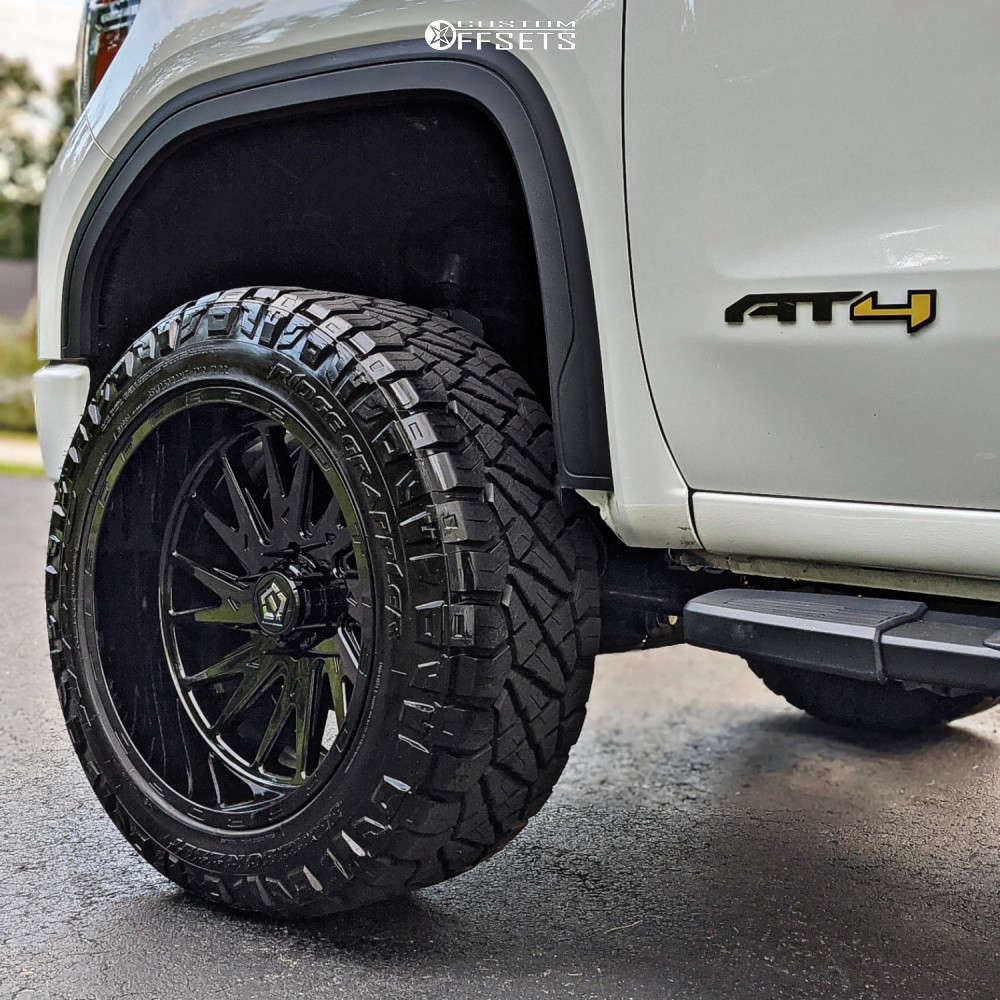 2020 GMC Sierra 1500 with 22x12 -44 TIS 547B and 35/12.5R22 Nitto Ridge ...